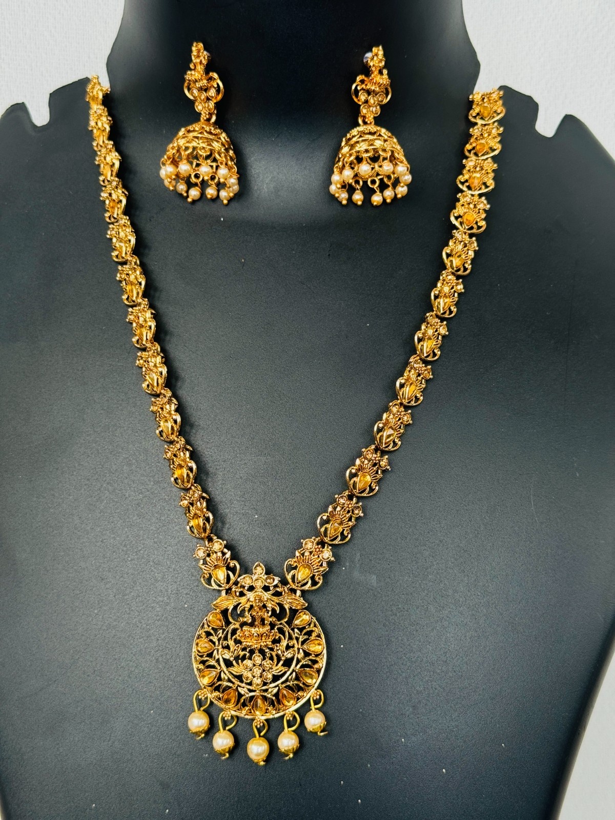 Dull Gold color very beautiful TEMPLE design long necklace and jimikky ...